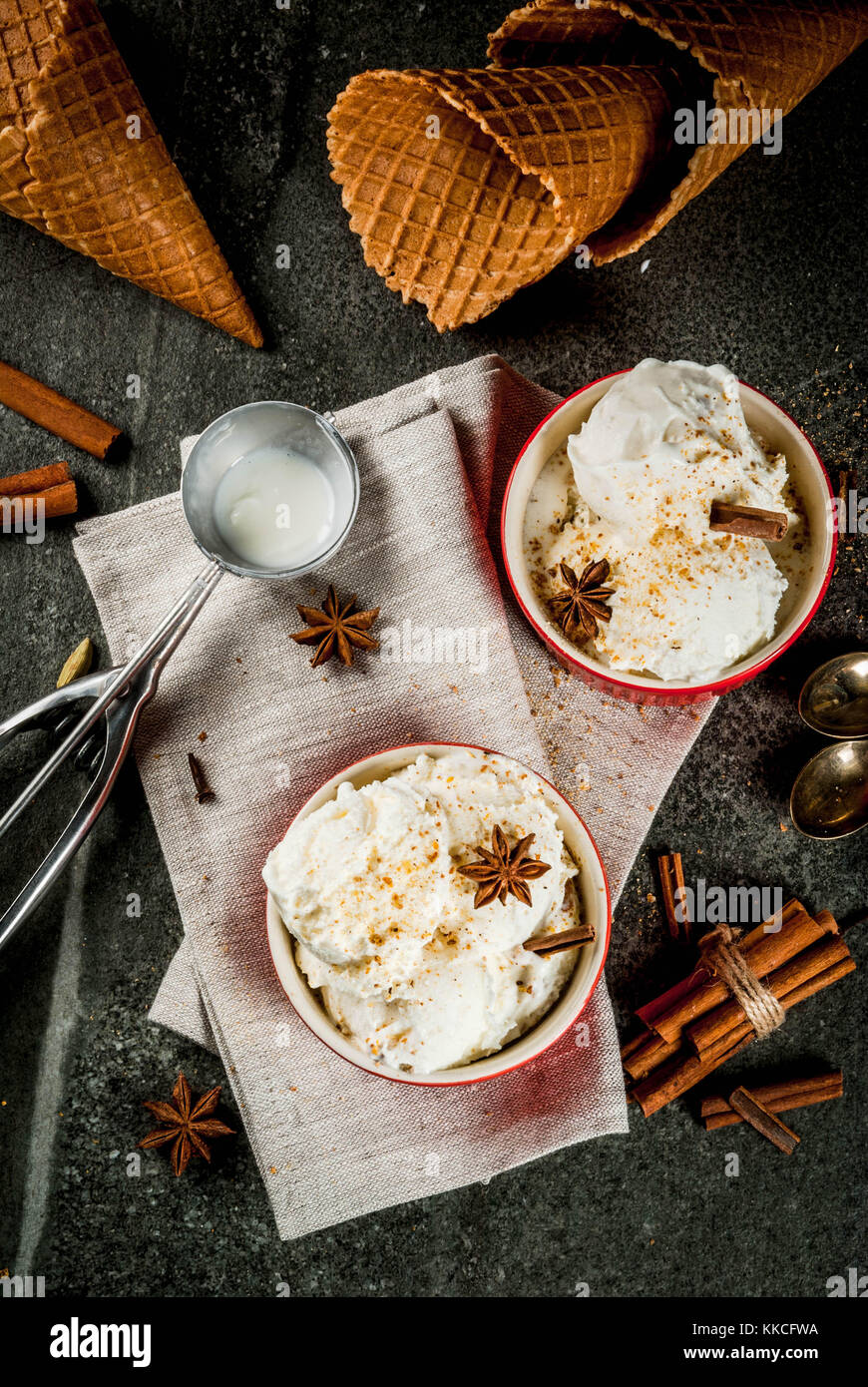 Cold Homemade Eggnog Ice Cream with Cinnamon and anise, on dark stone ...