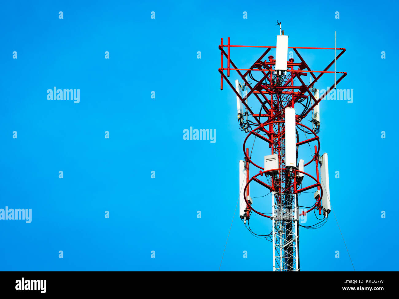 Telecommunication tower with clear blue sky background Stock Photo - Alamy