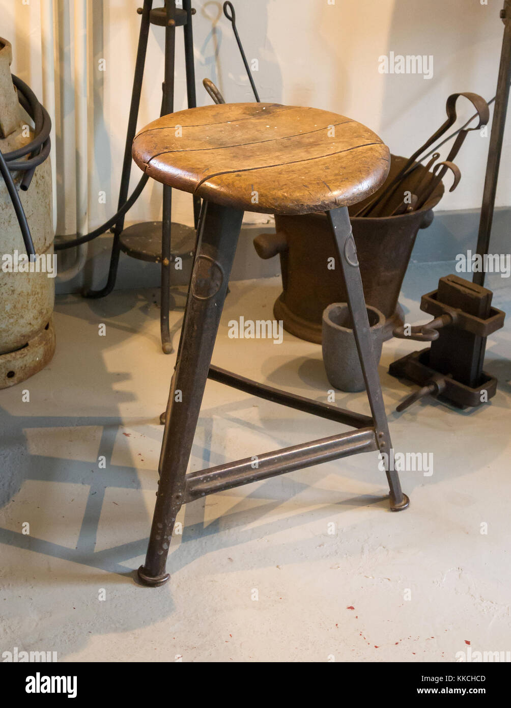 Old wooden stool standing in a workshop Stock Photo - Alamy