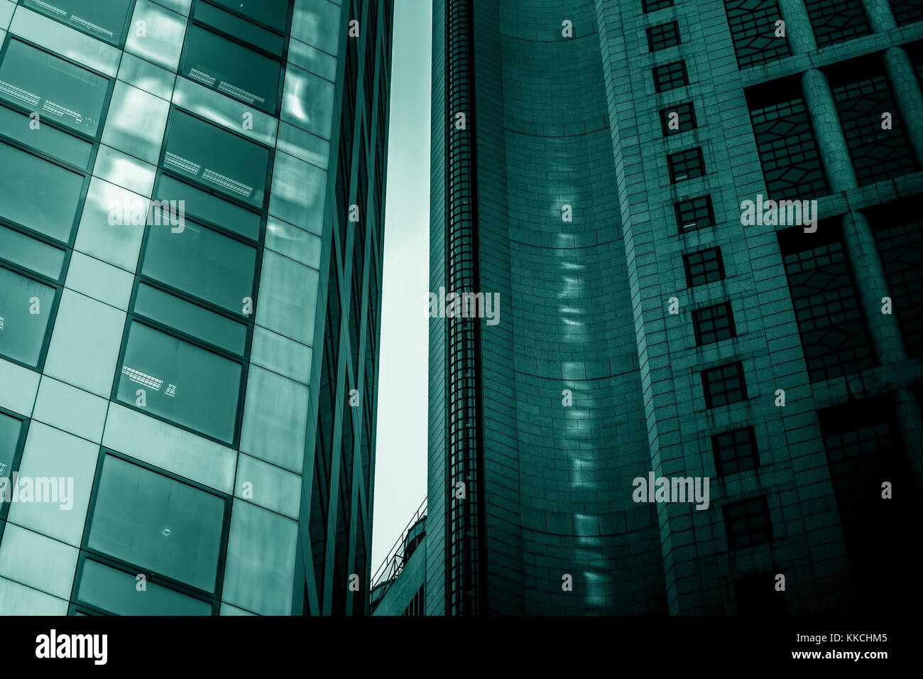 Modern office building detail in green color Stock Photo - Alamy