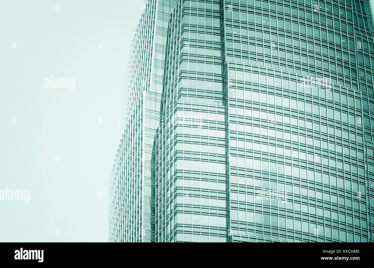 Modern office building detail in green color Stock Photo - Alamy