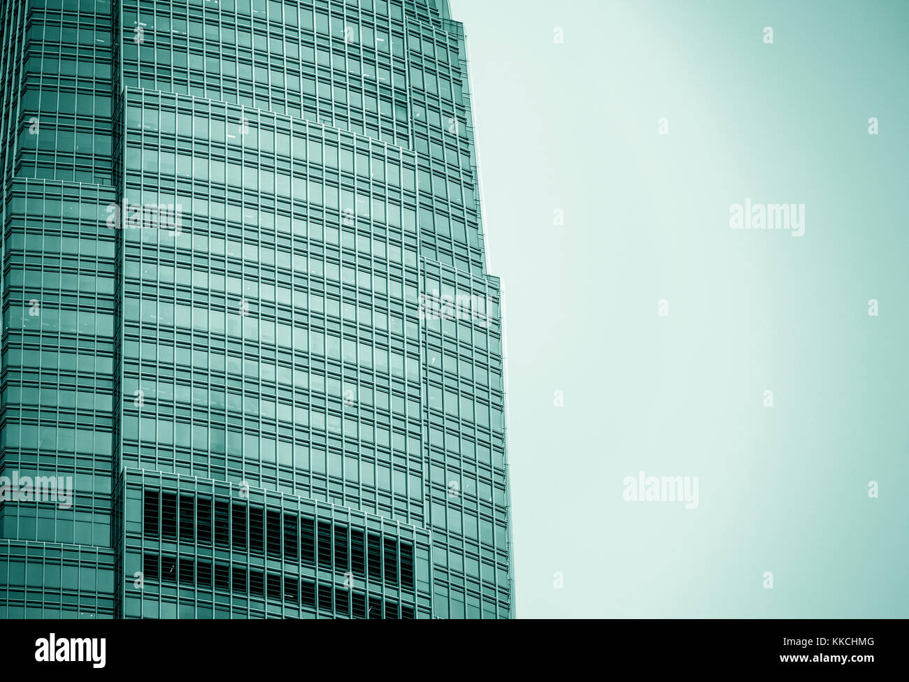 Modern office building detail in green color Stock Photo - Alamy