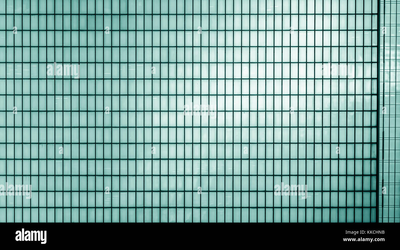 Modern office building detail in green color Stock Photo - Alamy