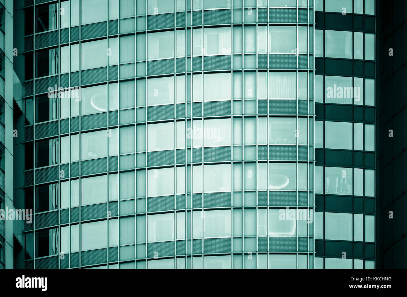 Modern office building detail in green color Stock Photo - Alamy