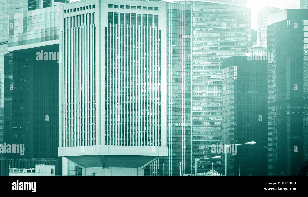 Modern office building detail in green color Stock Photo - Alamy
