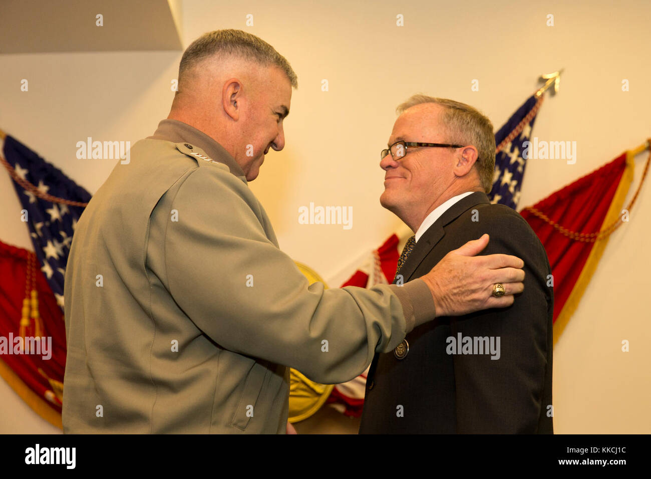 U.S. Marine Corps Gen. Glenn M. Walters, left, assistant commandant of ...