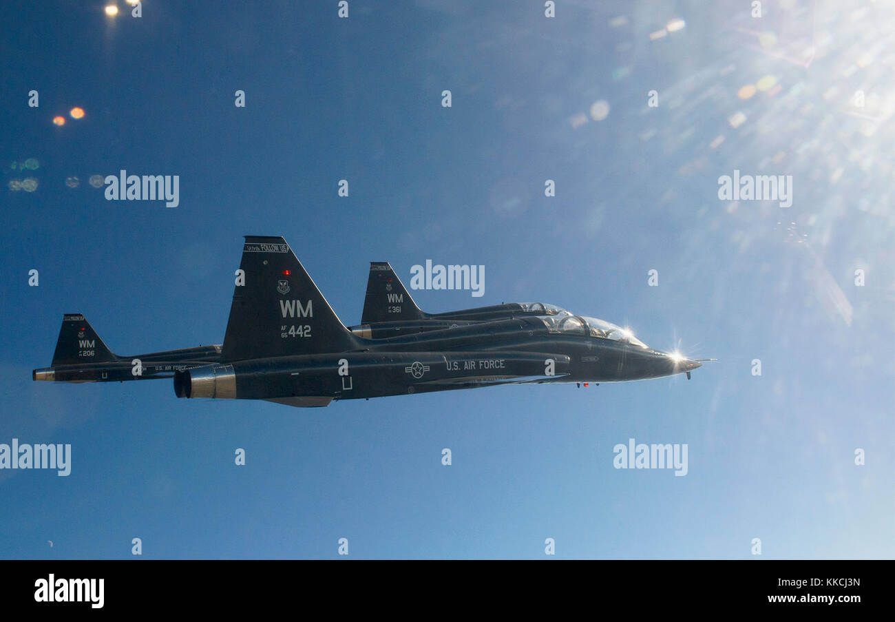 Pilots assigned to the 393d Bomb Squadron fly T-38 Talons in formation ...