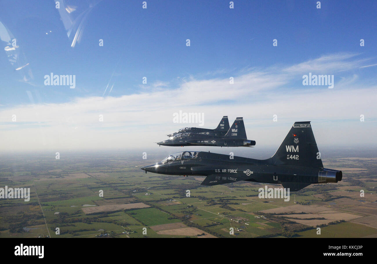 Pilots assigned to the 393d Bomb Squadron fly T-38 Talons in formation ...