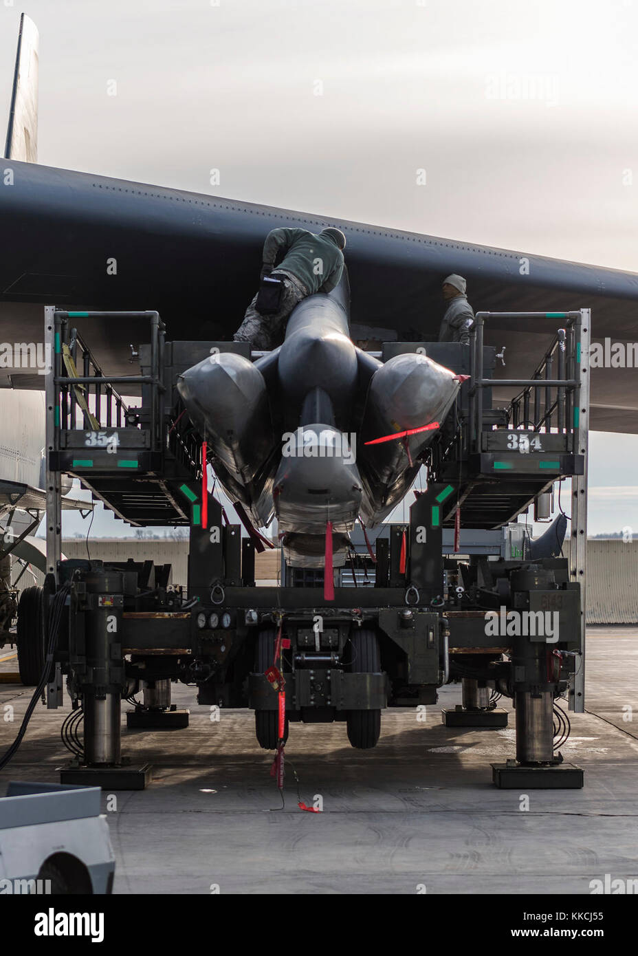 Team Minot Airmen load munitions on to a B-52H Stratofortress assigned ...