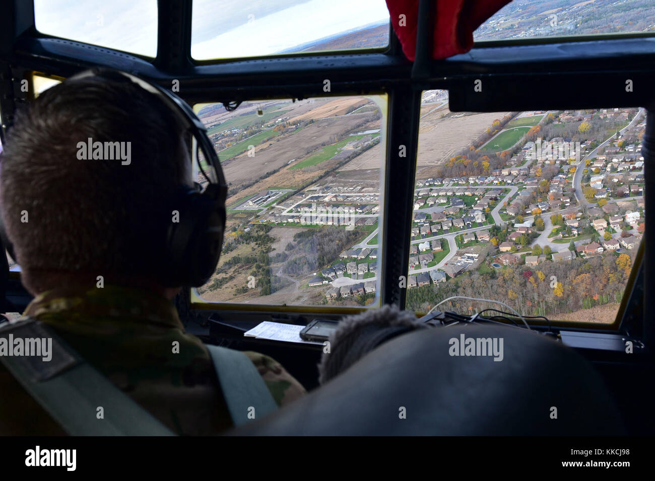 Capt. Mike Jones, 61st Airlift Squadron instructor pilot, looks over ...