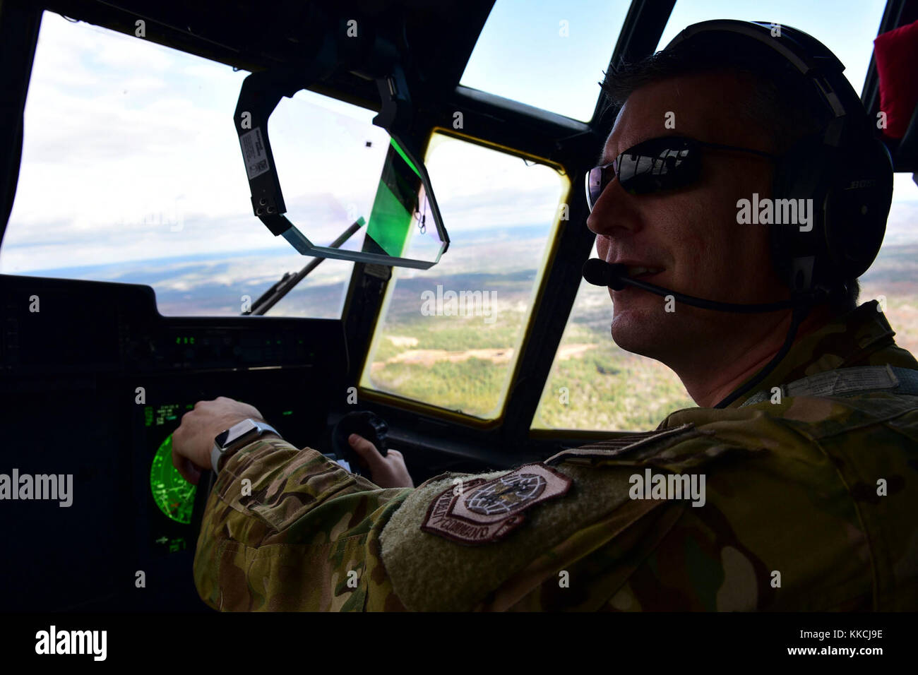 Capt. Mike Jones, 61st AS instructor pilot, talks to his co-pilot Nov ...