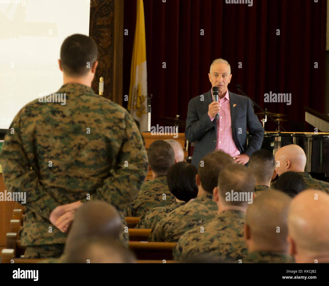 Retired U.S. Navy Lt. Cmdr. William Krissoff speaks to the Marines and ...
