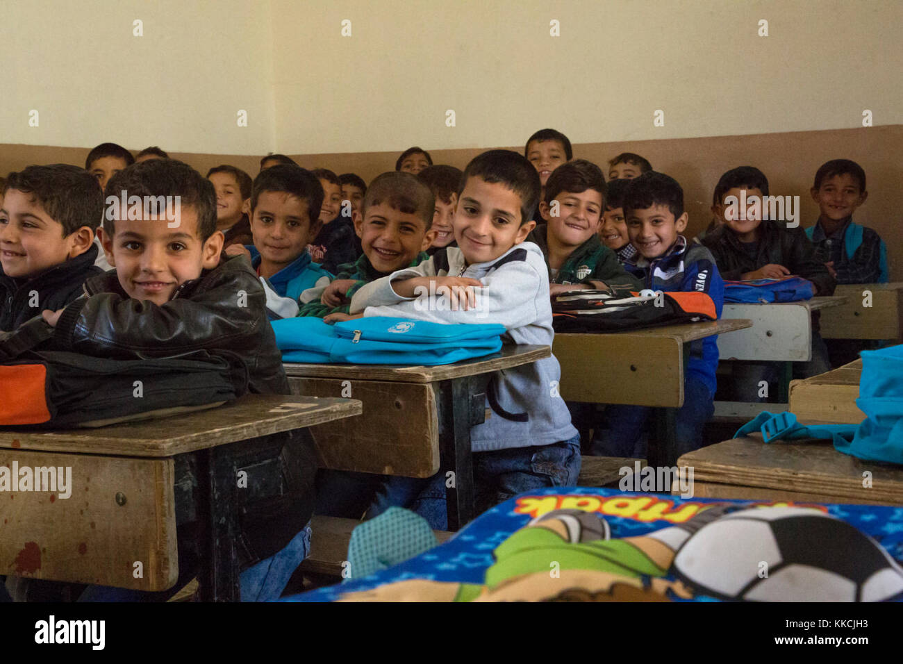 Young Iraqi students pose for a photo at a primary school, Aski Mosul ...