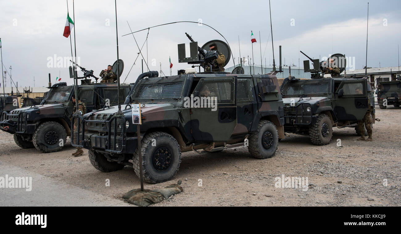 Italian Army Soldiers prepare their vehicles for a convoy operation in ...