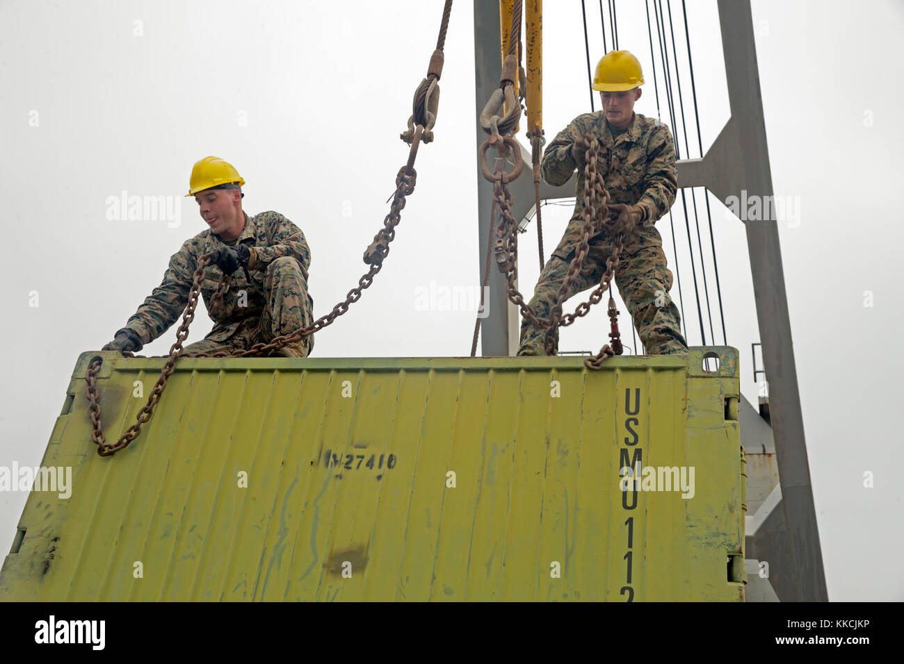 U.S. Marine Corps Cpl. Justin Cox, left, and Lance Cpl. Tyler M. Kunkel ...