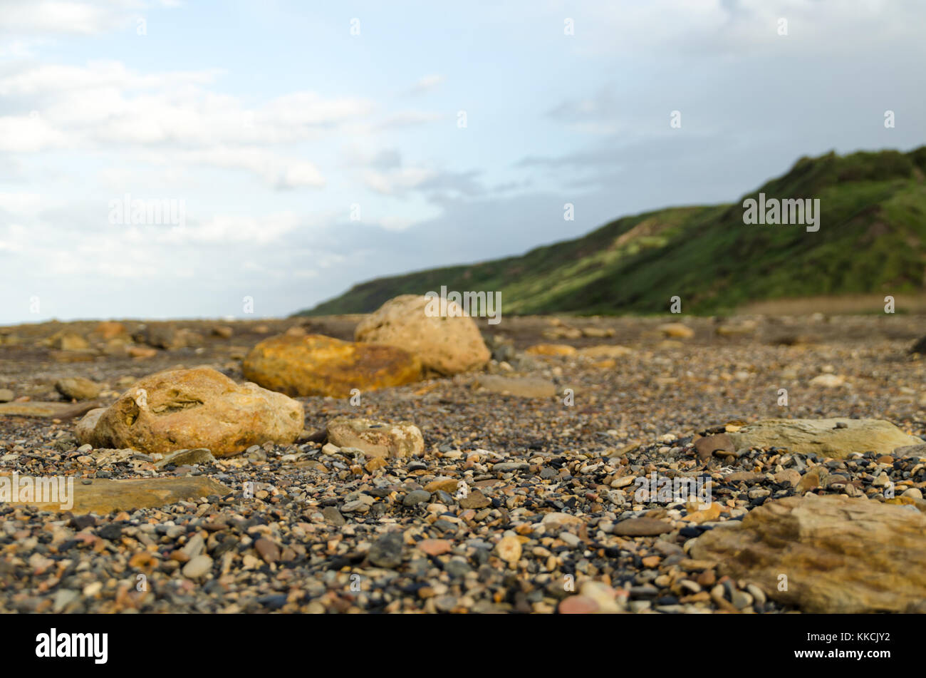 Rocks on Blast Beach, Dawdon, which are stained due to previous dumping ...