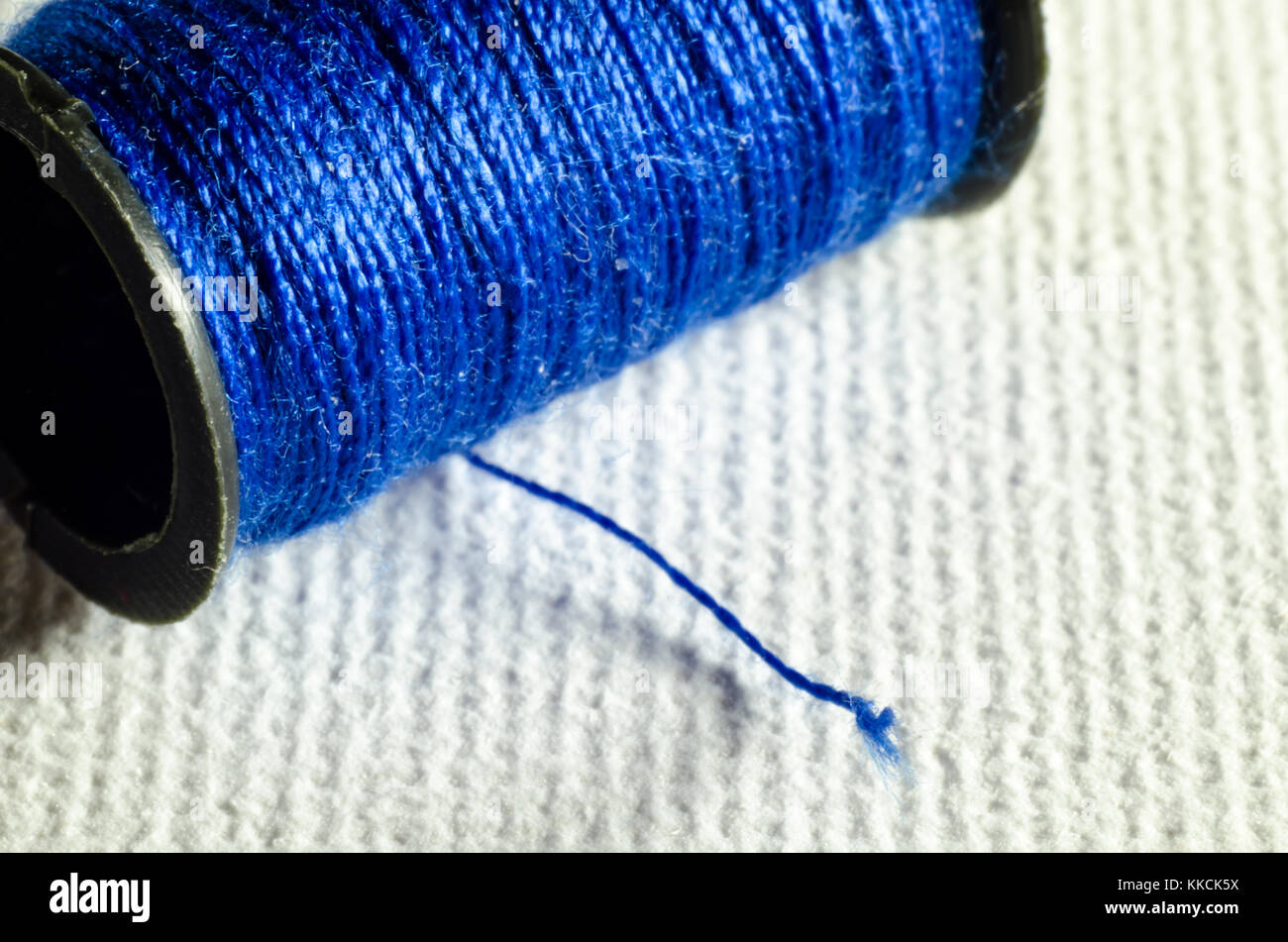 A Macro Photograph of a Bobbin of Blue Thread Stock Photo - Alamy