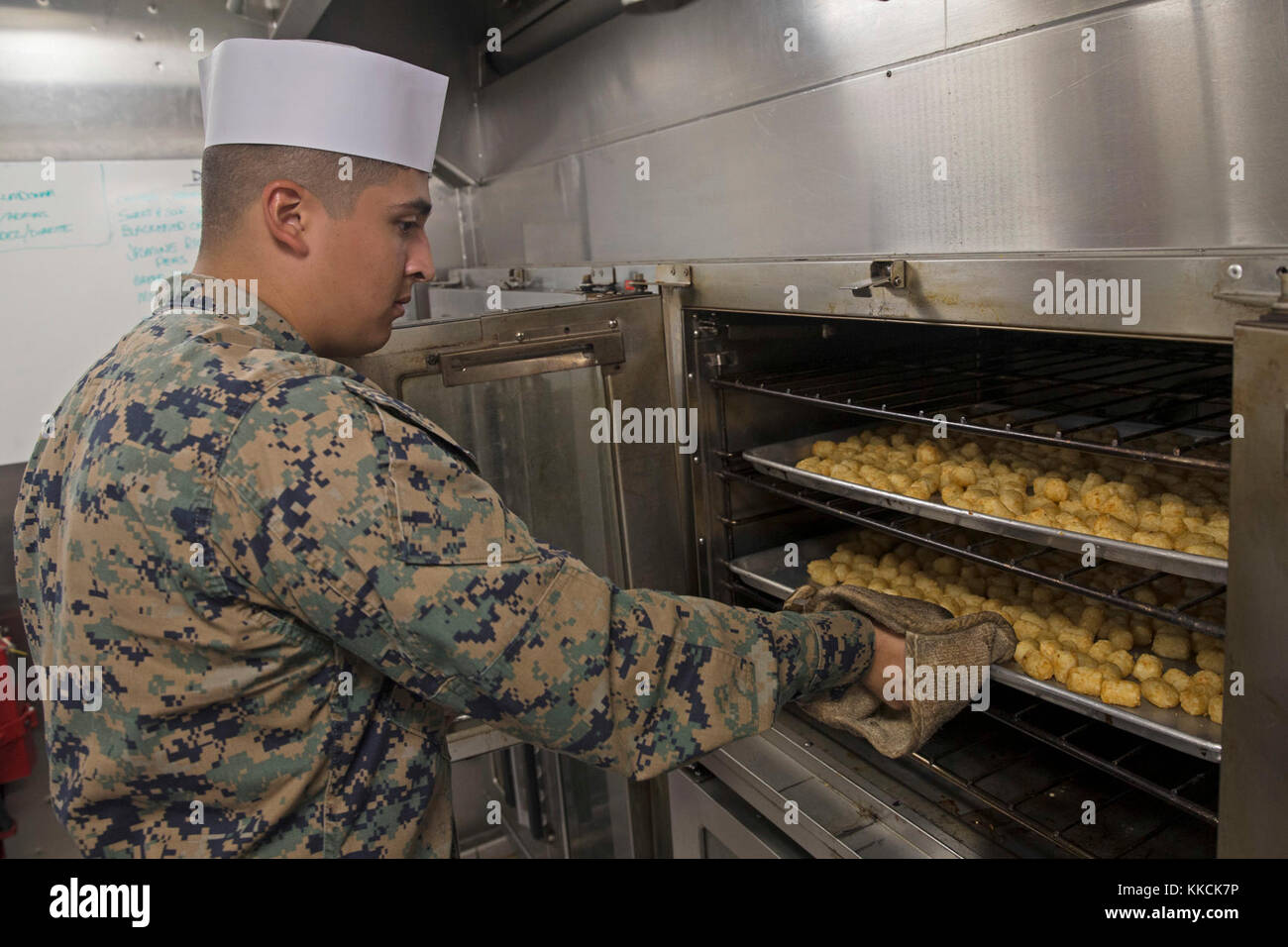 U.S. Marine Corps Lance Cpl. Alejandro Coronado, food service ...