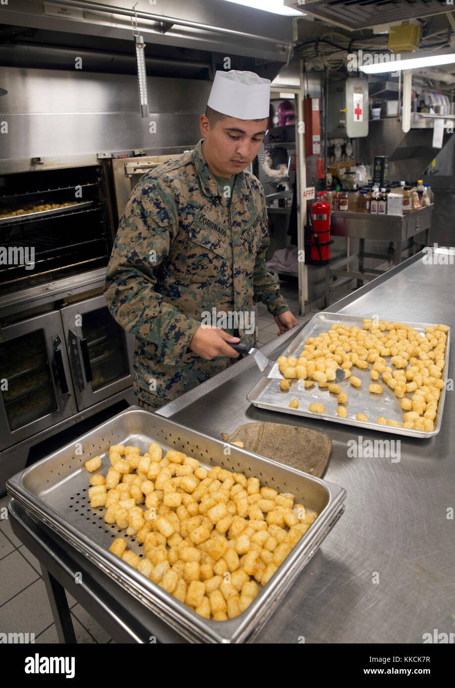 U.S. Marine Corps Lance Cpl. Alejandro Coronado, food service ...