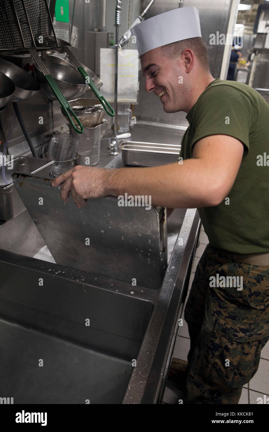U.S. Marine Corps Pfc. Martin L. Cravens, food service specialist with ...