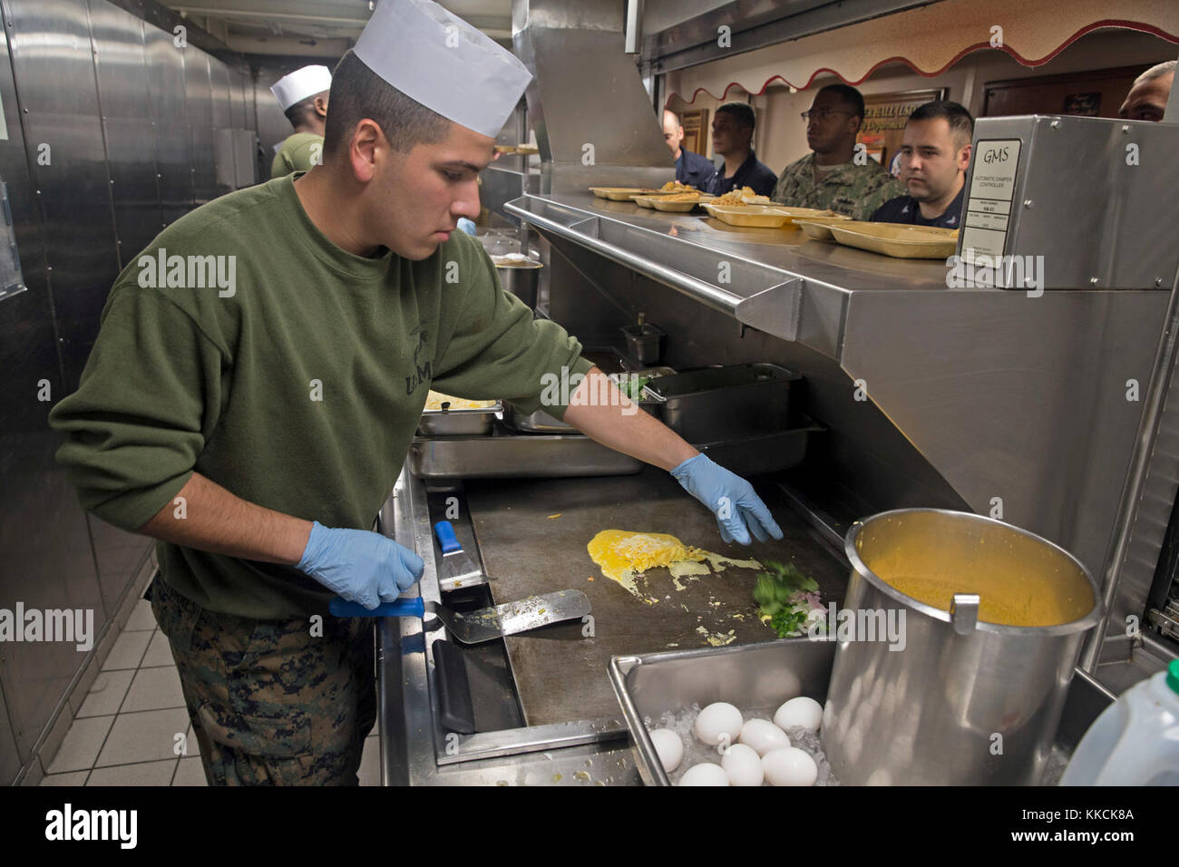 U.S. Marine Corps Pfc. Jorge Brieseno, food service specialist with 2nd ...