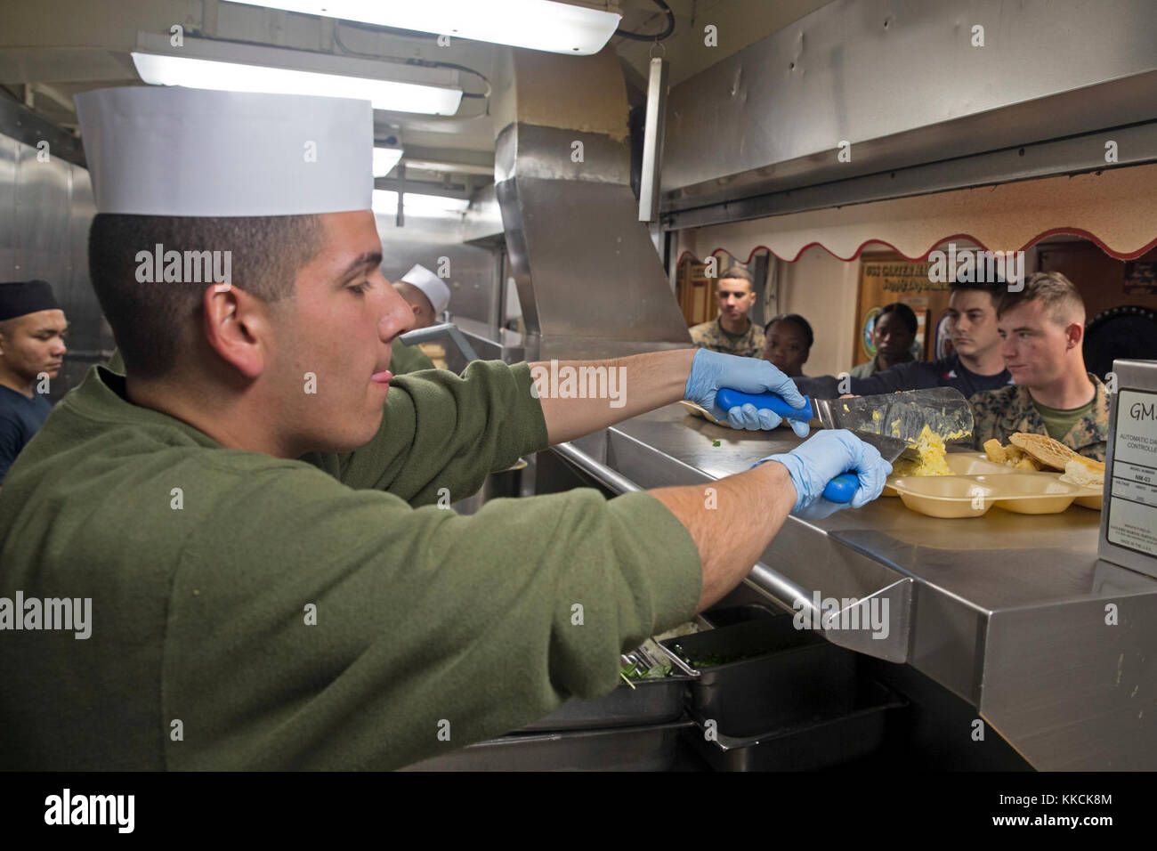 U.S. Marine Corps Pfc. Jorge Brieseno, food service specialist with 2nd ...