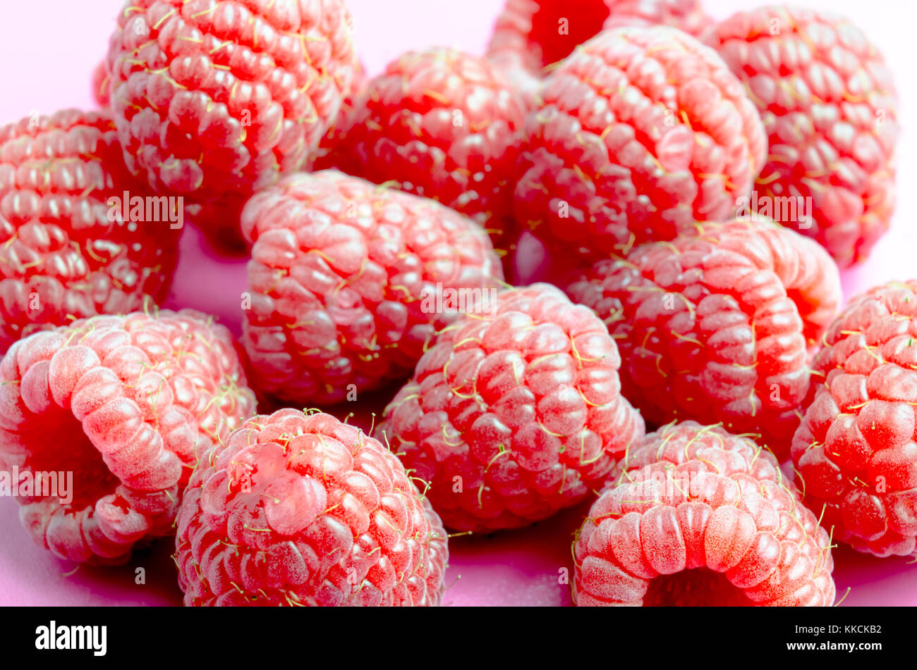 Raspberries Close-up in a White Bowl Stock Photo - Alamy