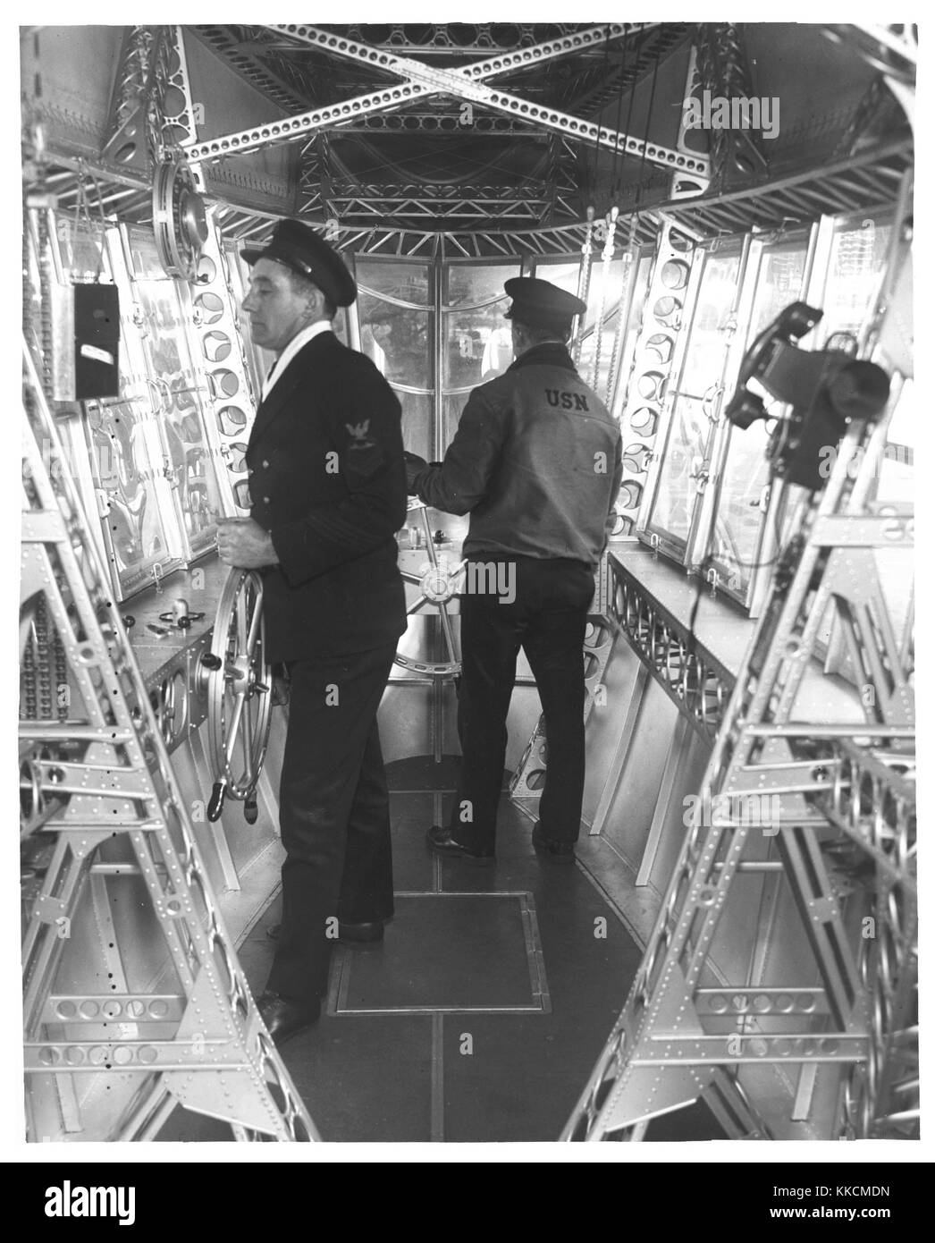 Photograph of crew members in Emergency Control Station of a dirigible ...