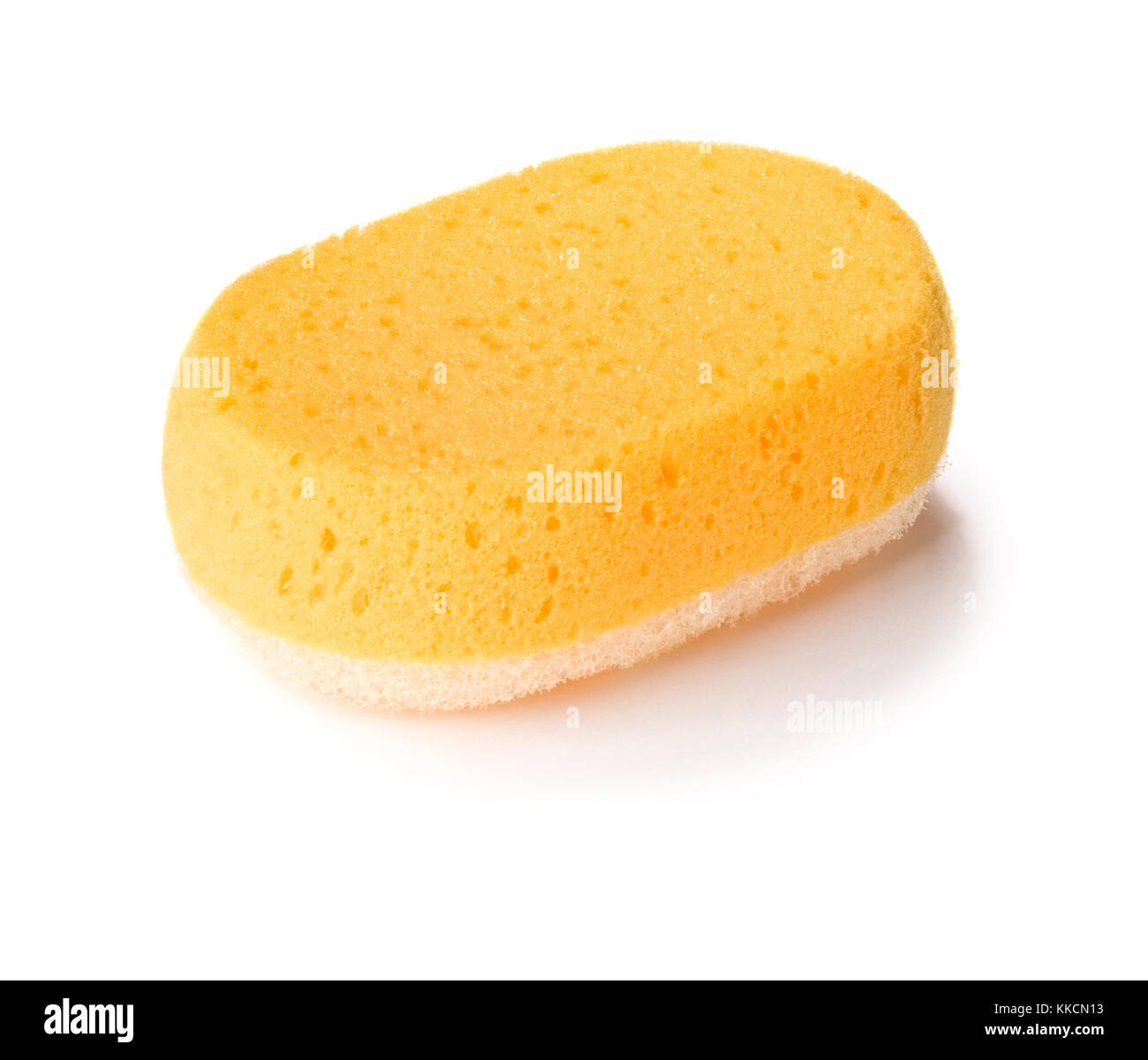 close-up of yellow sponge on a white background Stock Photo - Alamy