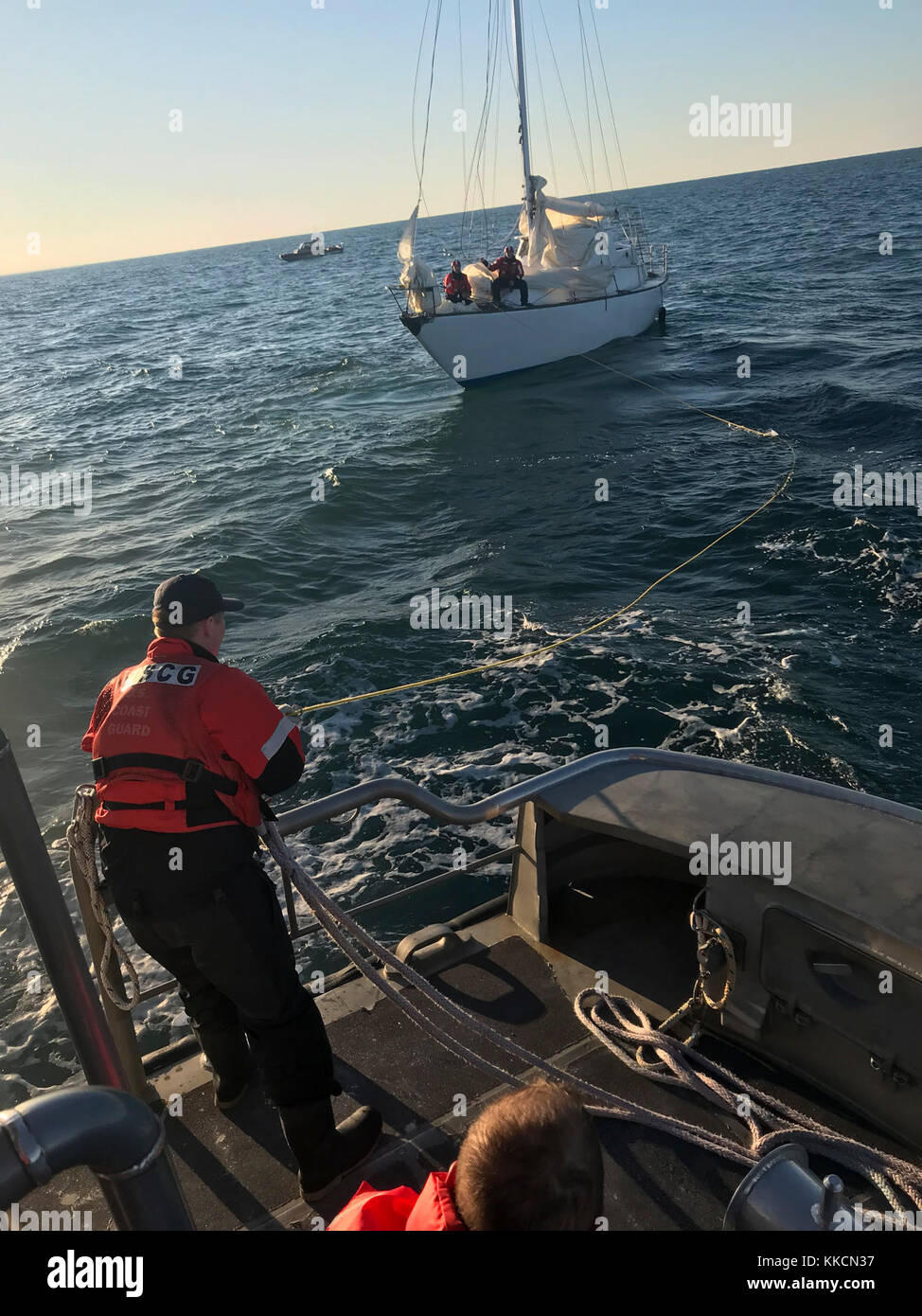 Coast Guard Seaman John Warren, a crew member at Coast Guard Station ...
