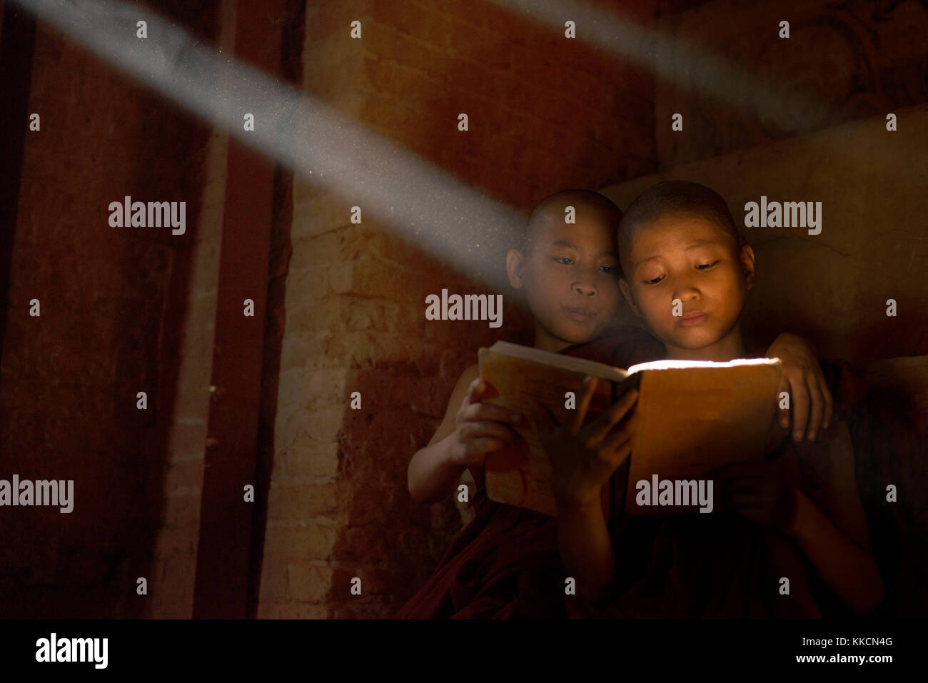 monks reading in monastry Stock Photo - Alamy