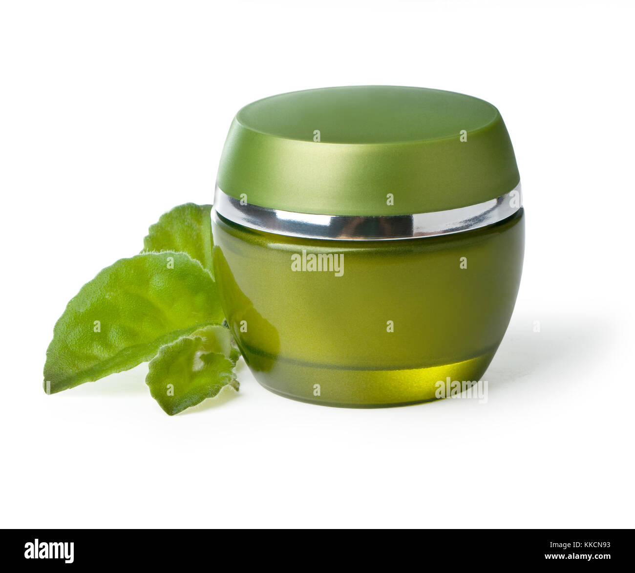 jar of green cream isolated on white background Stock Photo - Alamy