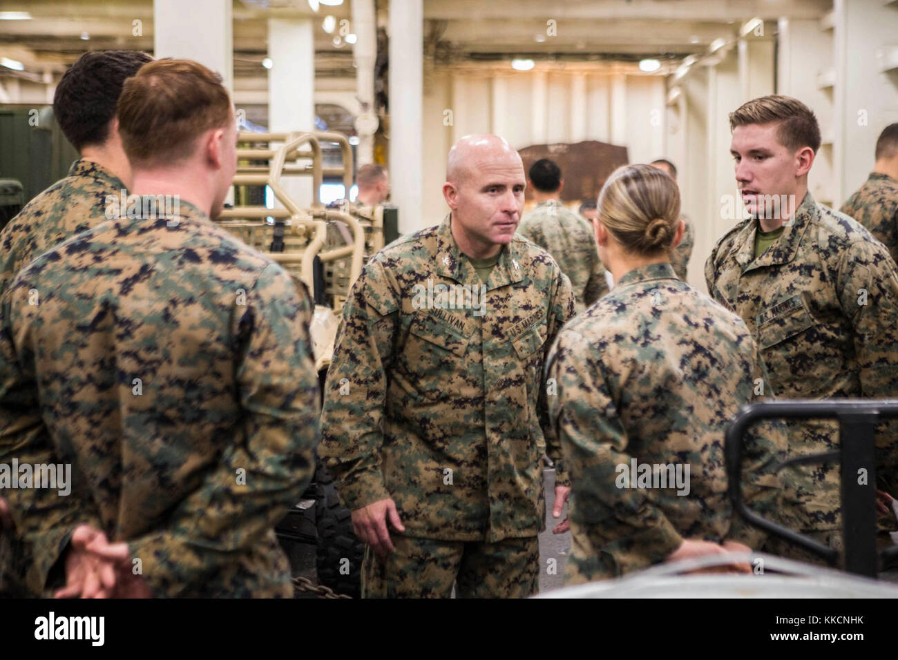 U.S. Marine Corps Col. Farrell J. Sullivan, right, commanding officer ...