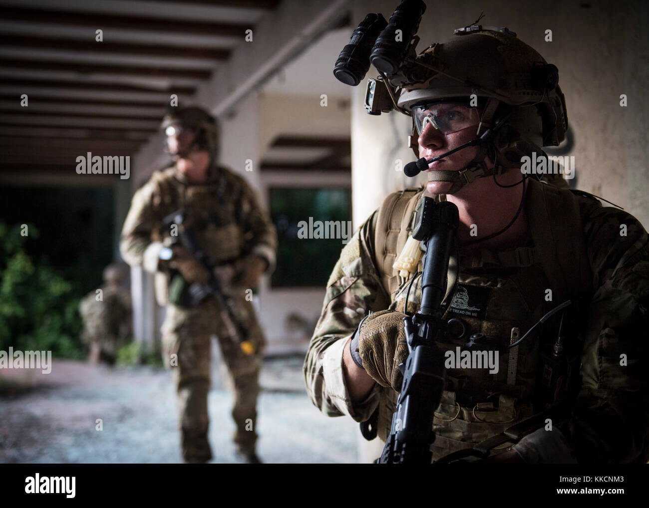 U.S. Navy Explosive Ordnance Disposal Technicians, assigned to ...