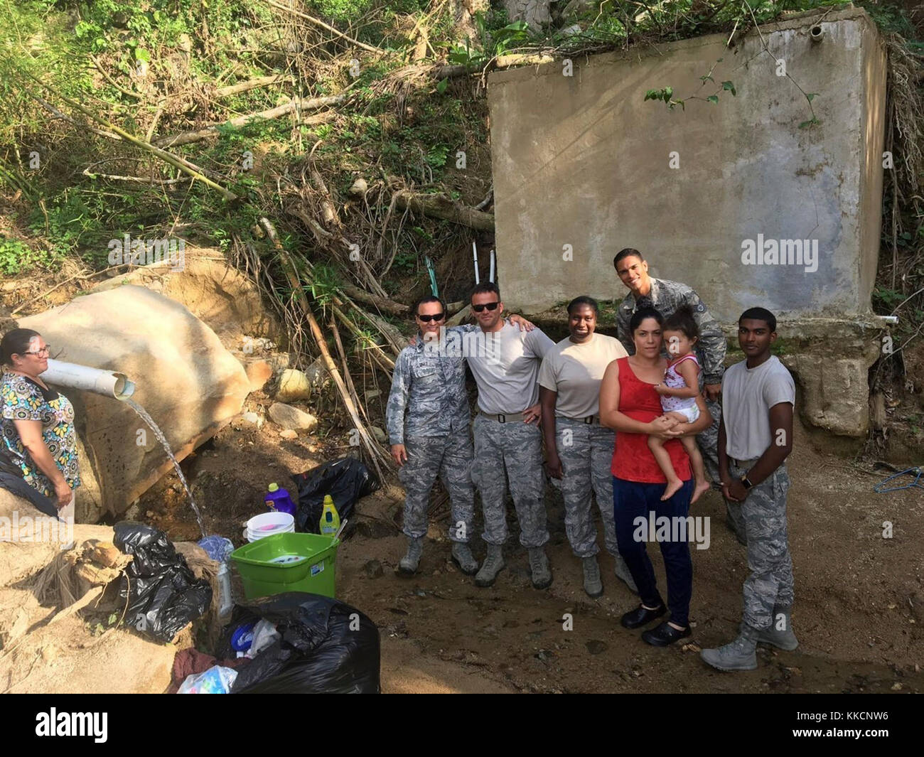 An emergency relief team poses for a photo in Puerto Rico on Oct. 28 ...