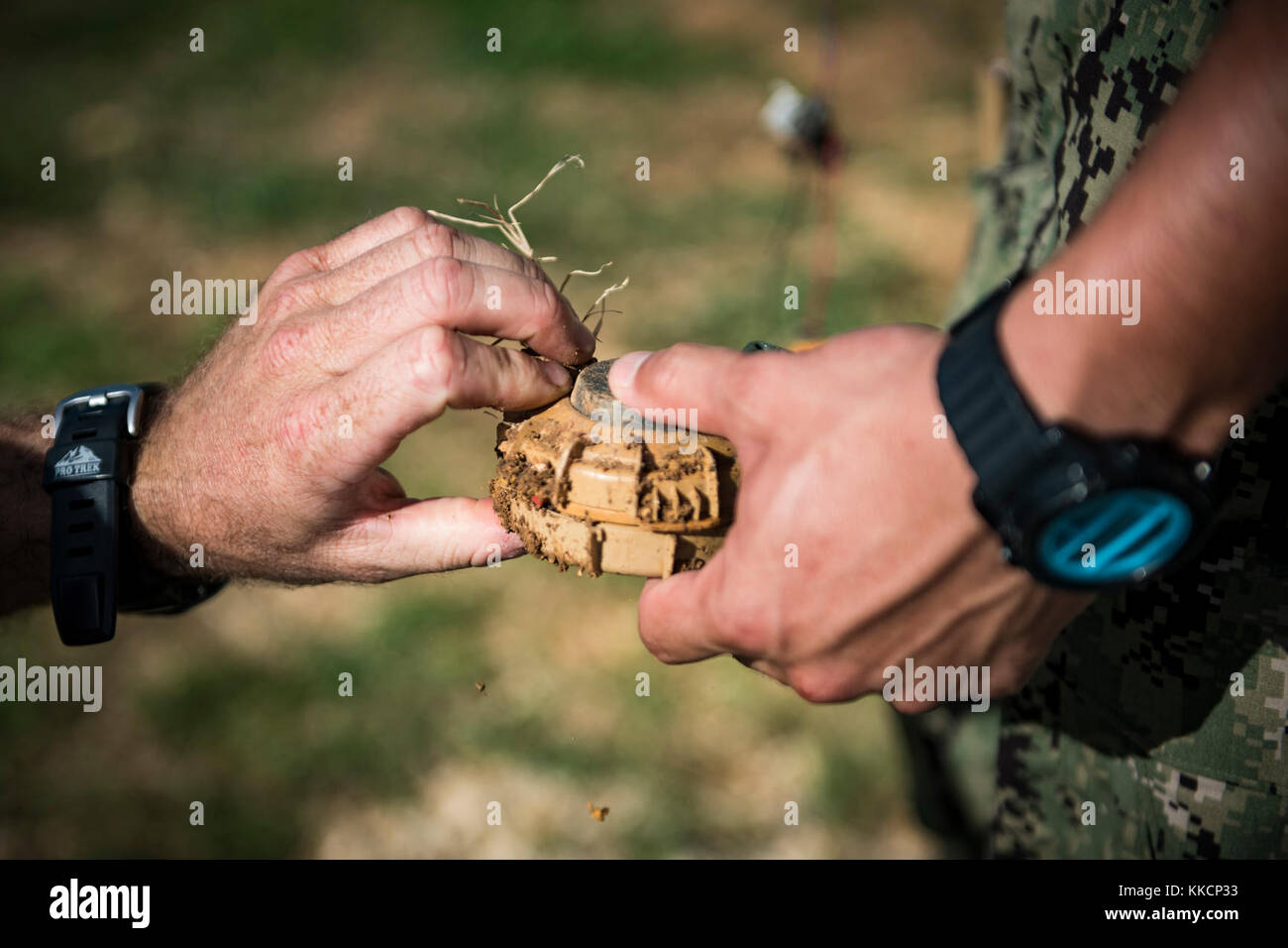 U.S. Navy Explosive Ordnance Disposal Technicians, assigned to ...