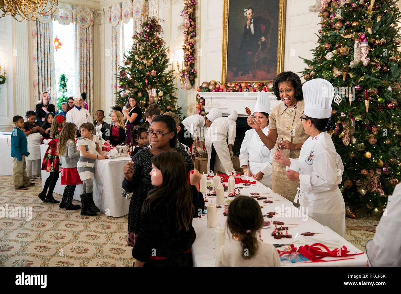 First Lady Michelle Obama is joined by White House Executive Chef Cris ...