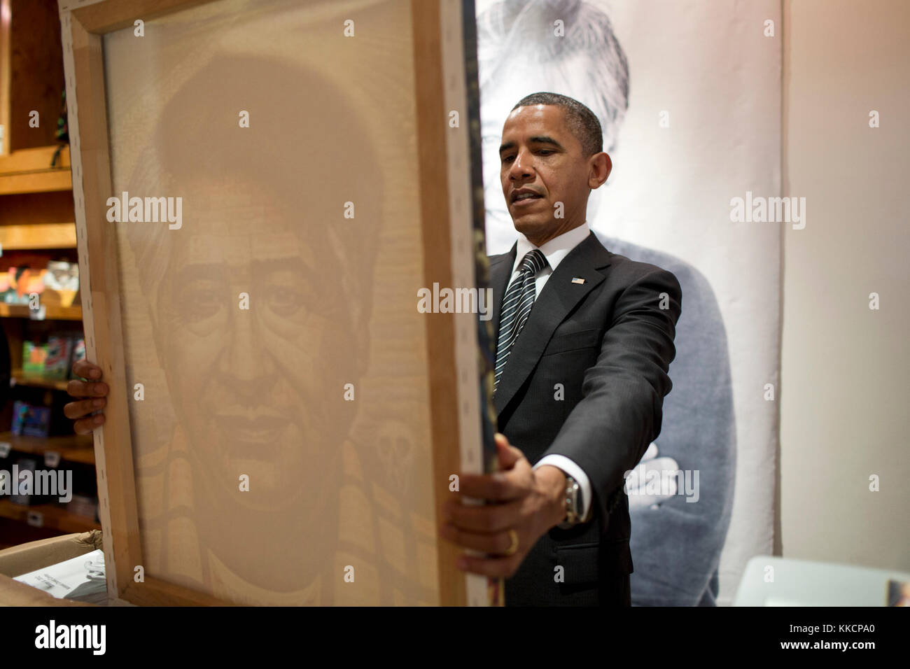 President Barack Obama views a portrait of César Chávez before the ...