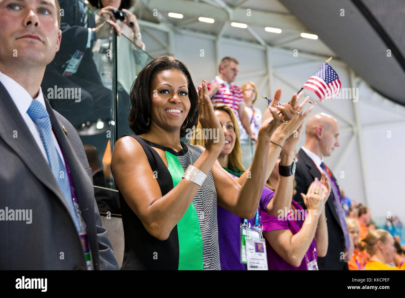 First Lady Michelle Obama watches the swimming finals and medal ...