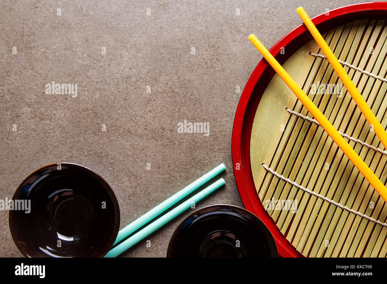 Chinese food. Two chopsticks for eating. Food sticks. Dark background ...