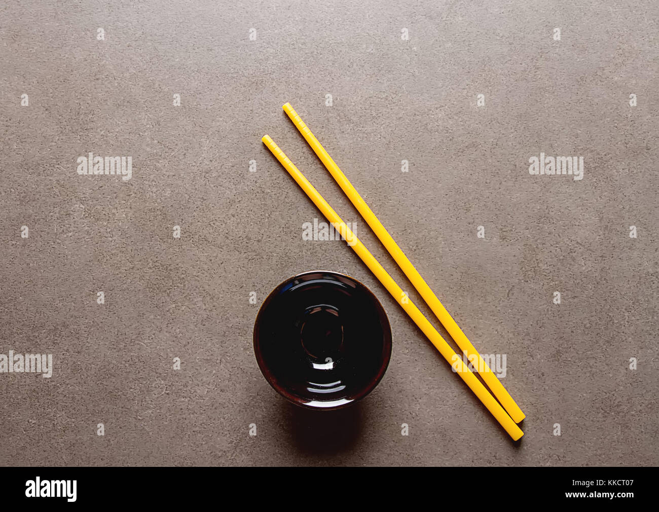 Chinese food. Two chopsticks for eating. Food sticks. Dark background ...