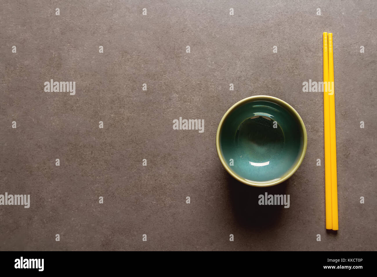 Chinese food. Two chopsticks for eating. Food sticks. Dark background ...