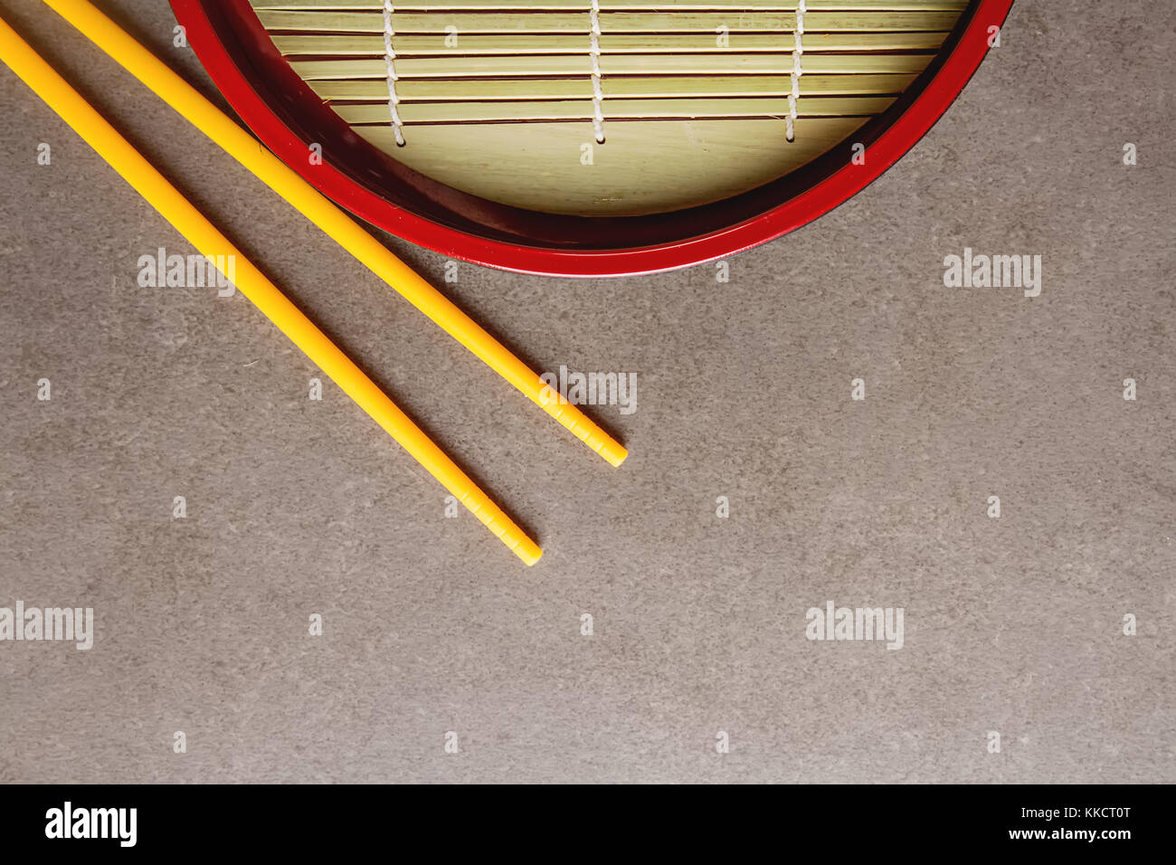 Chinese food. Two chopsticks for eating. Food sticks. Dark background ...