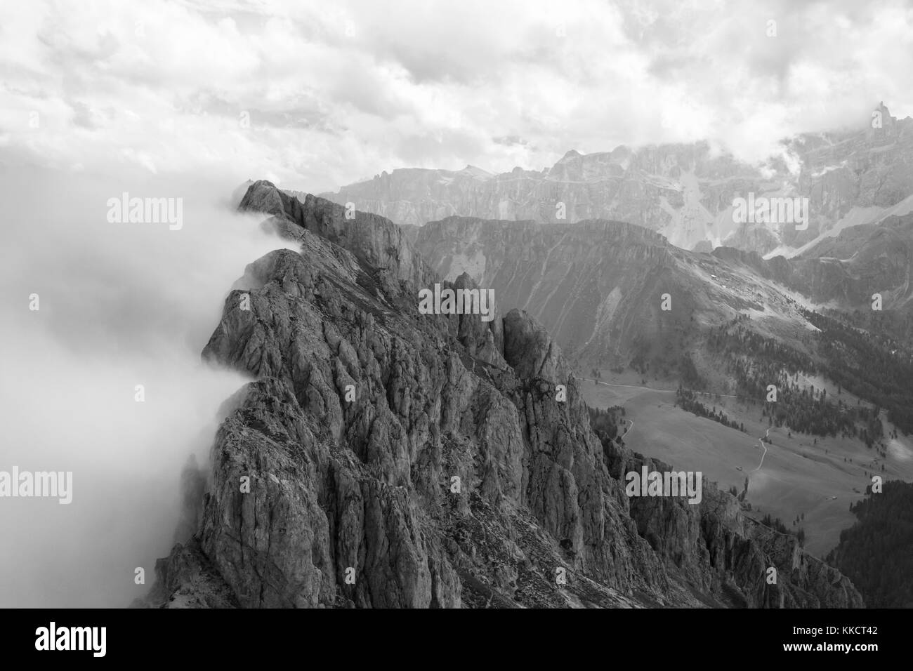 Aerial view of a mountain ridge in dolomites in a windy day Stock Photo ...
