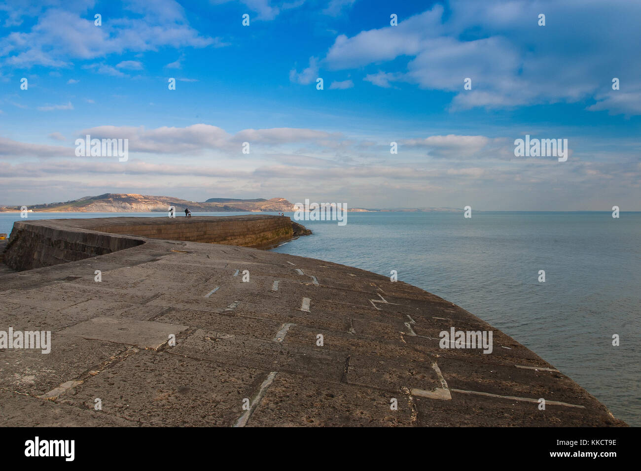 The famous cobb in Lyme Regis, England. The Cobb an old stone pier ...