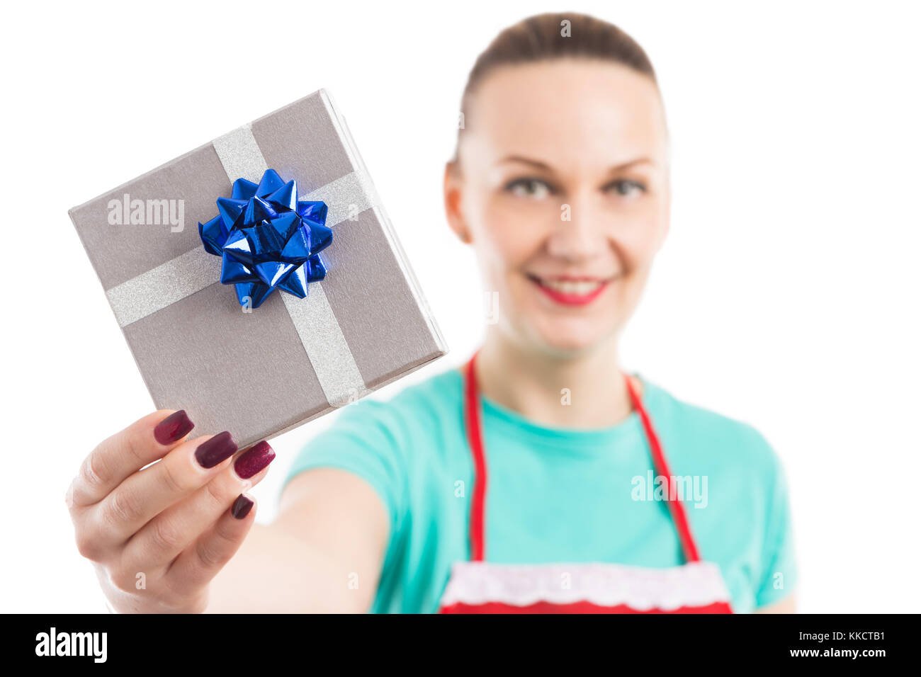 Housekeeper or maid showing the gift box she received from the landlord ...