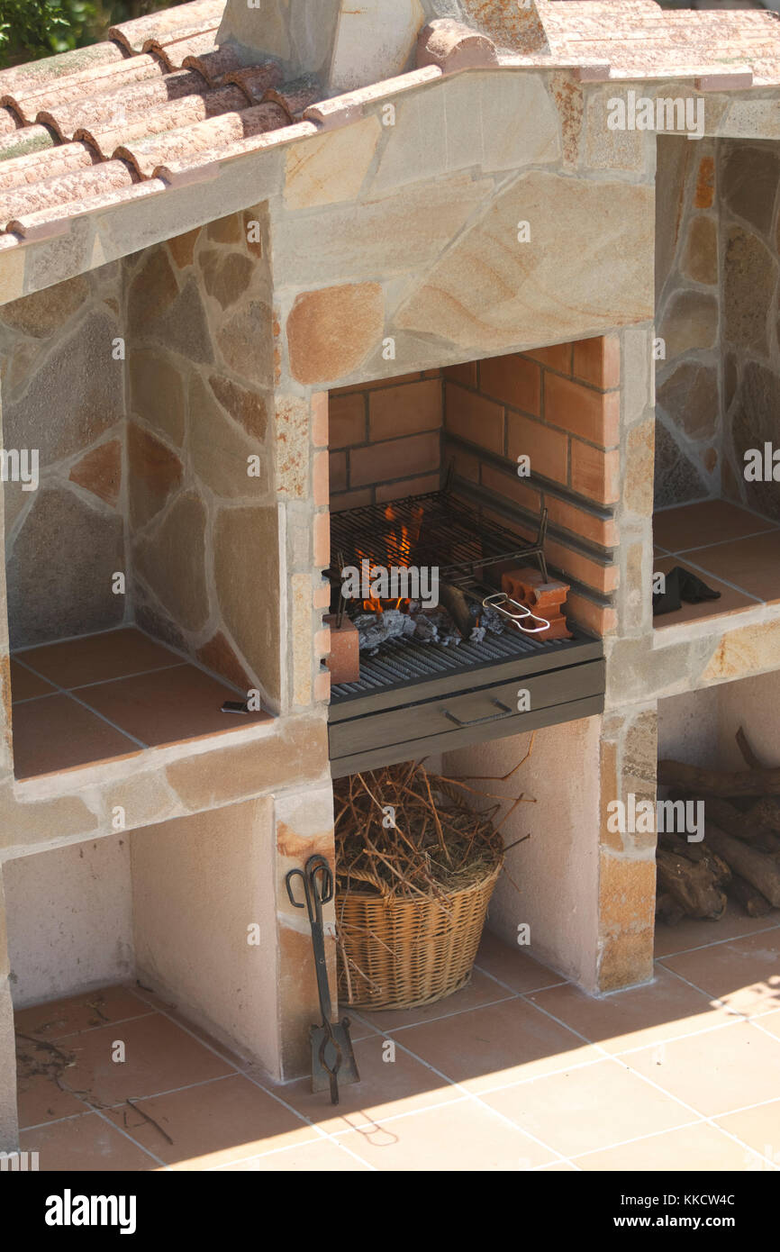 Built in stone construction barbecue for outdoors Stock Photo - Alamy