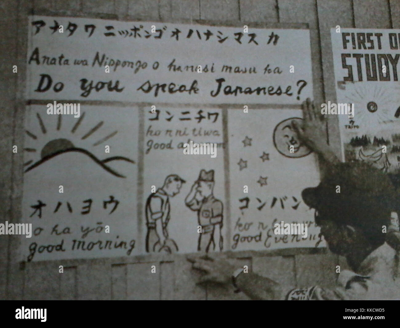 Japanese soldiers post instructive Japanese posters Stock Photo - Alamy