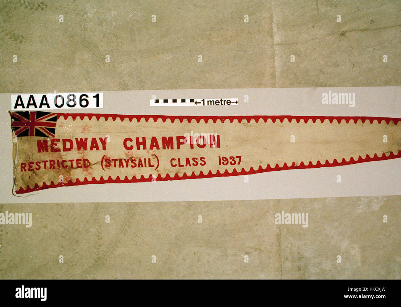 This image depicts a Champion Thames barge pennant, crafted from white ...