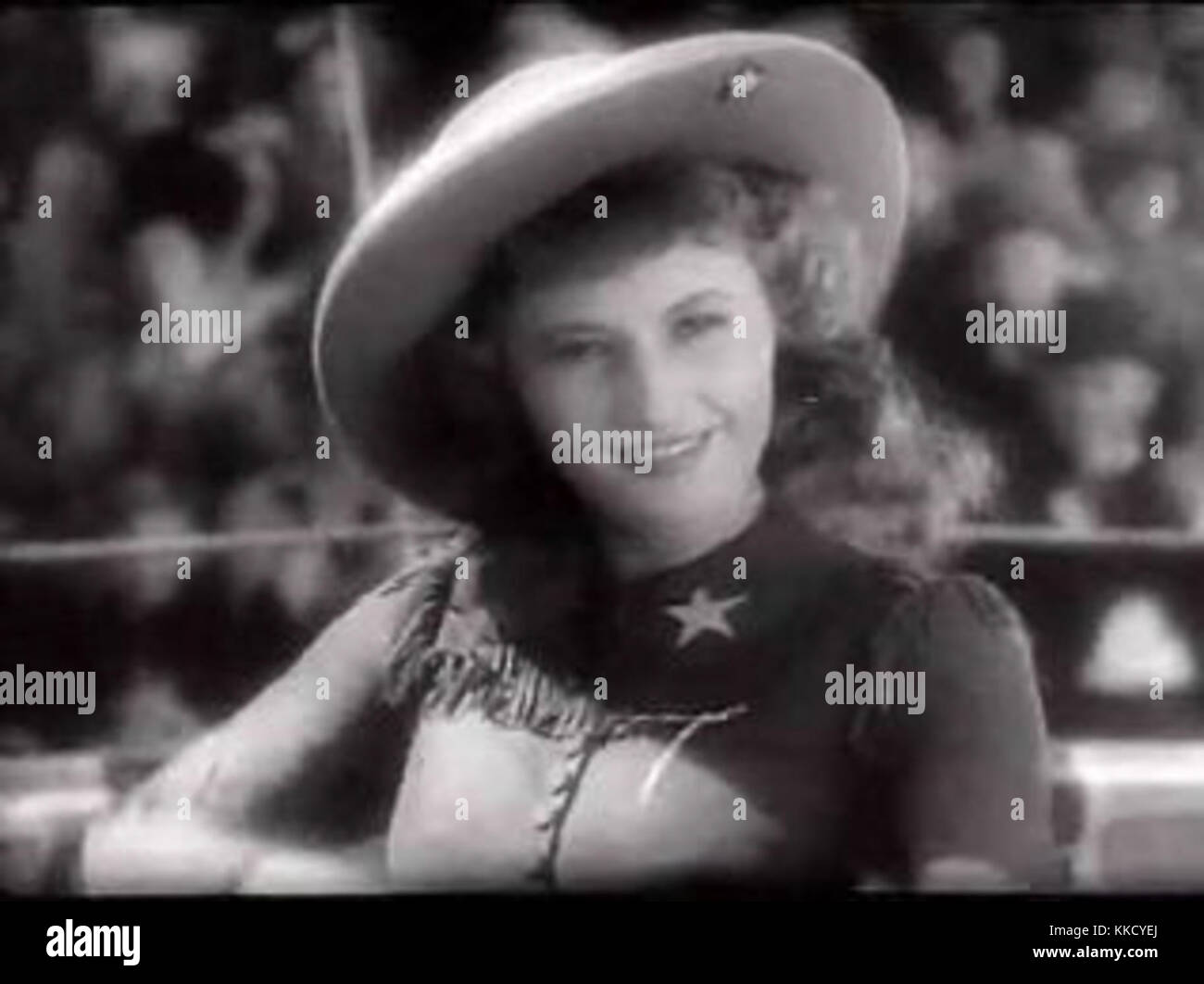 Barbara Stanwyck in Annie Oakley trailer Stock Photo - Alamy